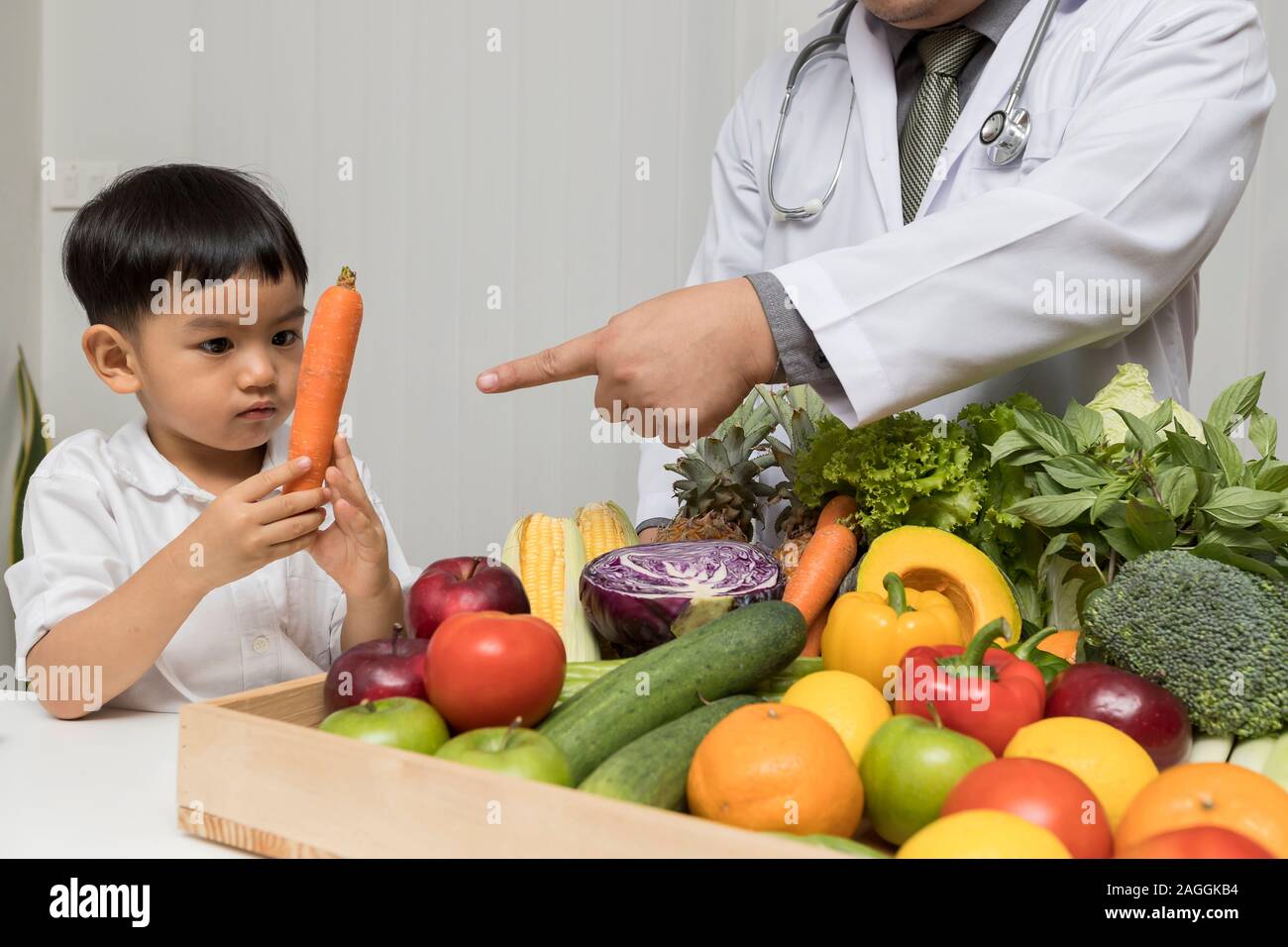 Children and doctors happy to have healthy food.Kid learning about ...