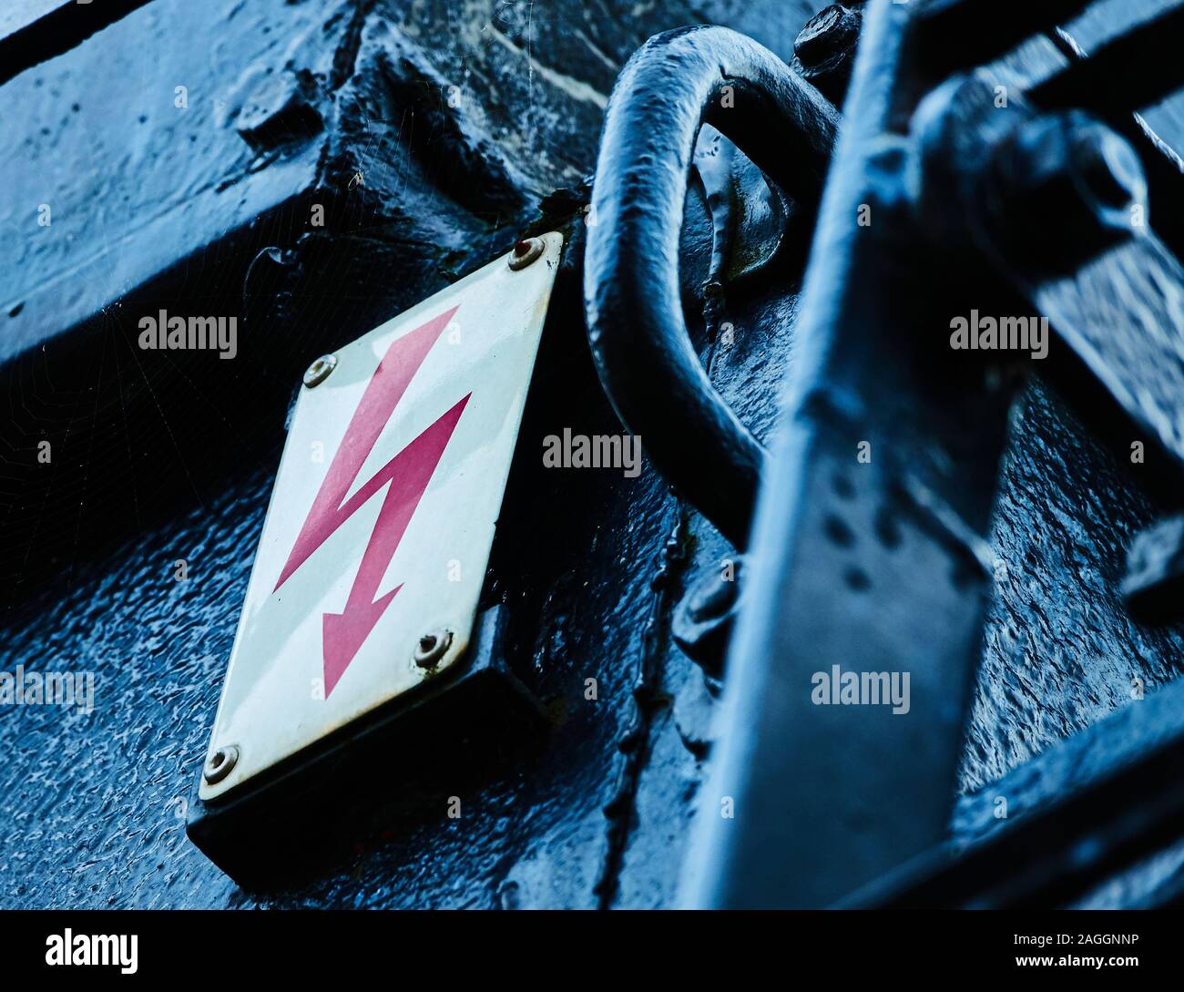 Red serrated arrow on a yellow background on a black historic ...