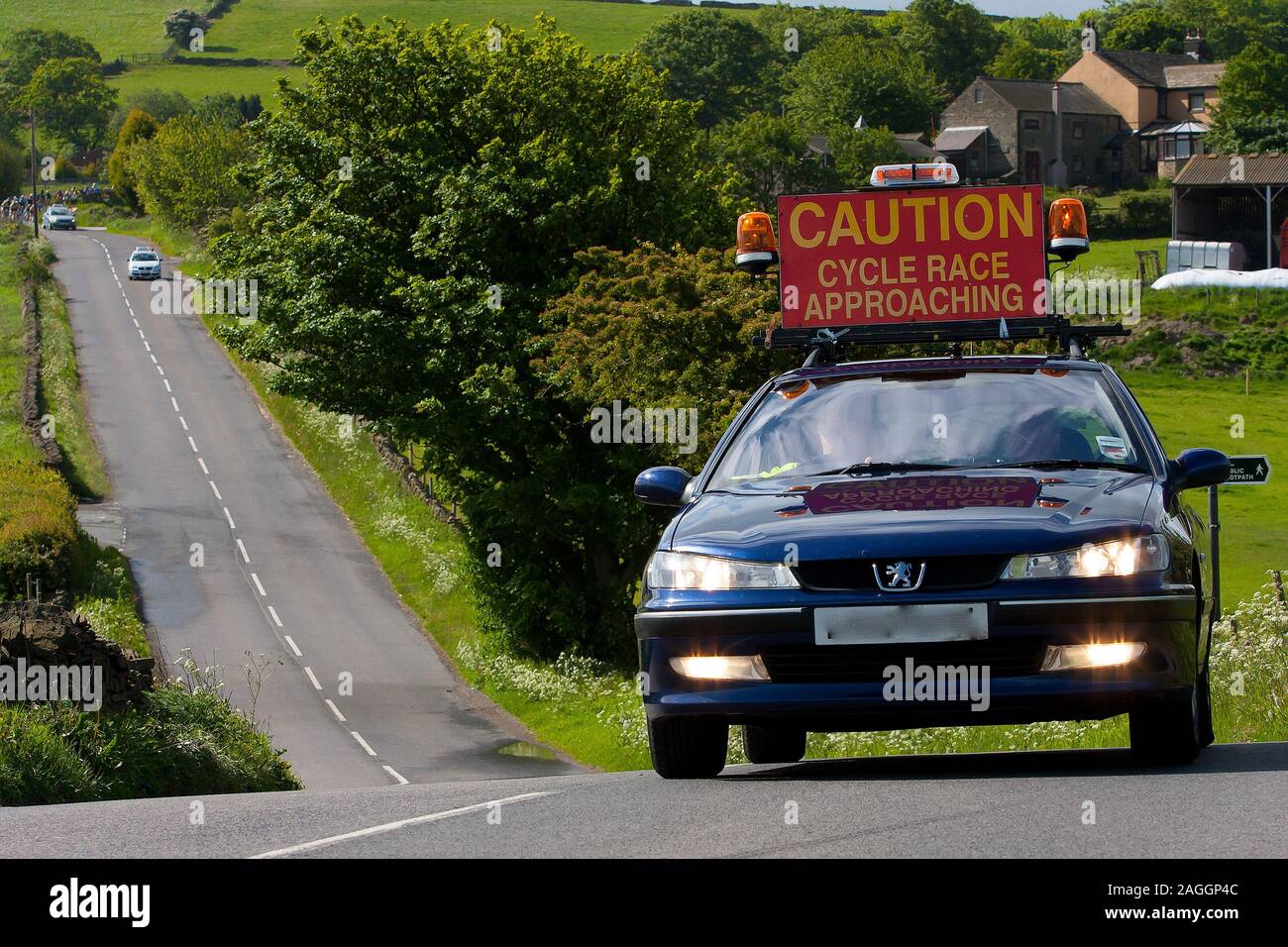 Cycle race lead car Stock Photo - Alamy