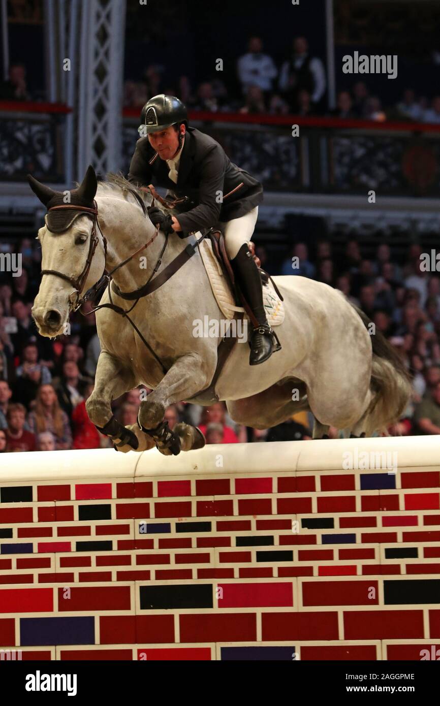LONDON, ENGLAND - DECEMBER 18TH Guy Williams riding Mr Blue Sky during ...