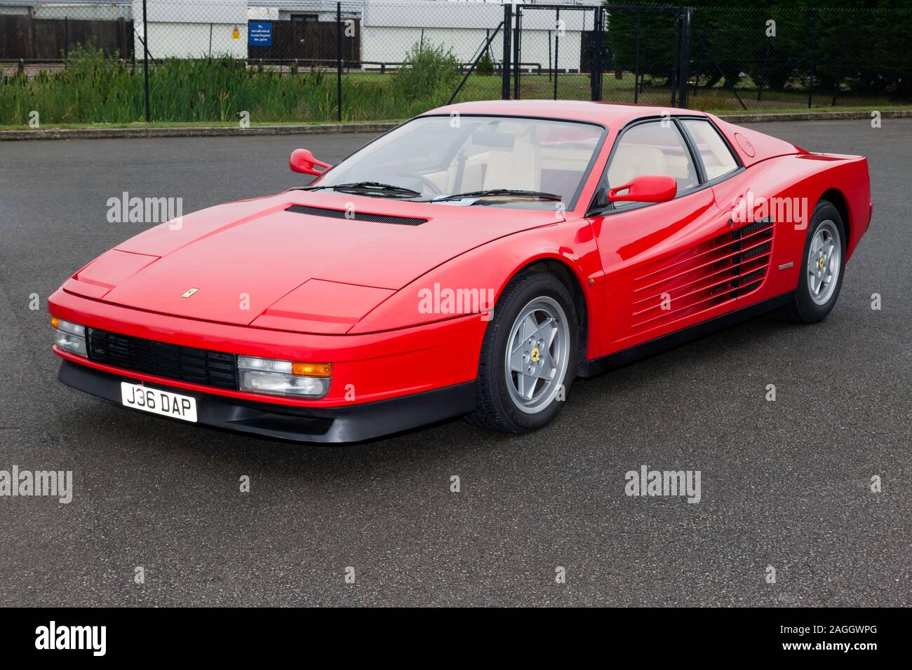 Three-quarters front view of a 1991, Red, Ferrari Testarossa, on ...
