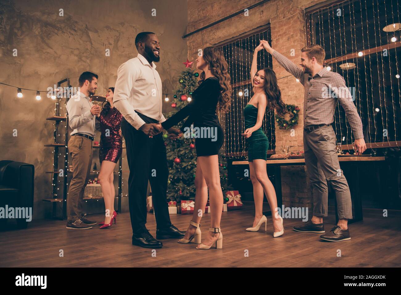 Full size low angle photo of charming lovers dance hold hands spinning ...