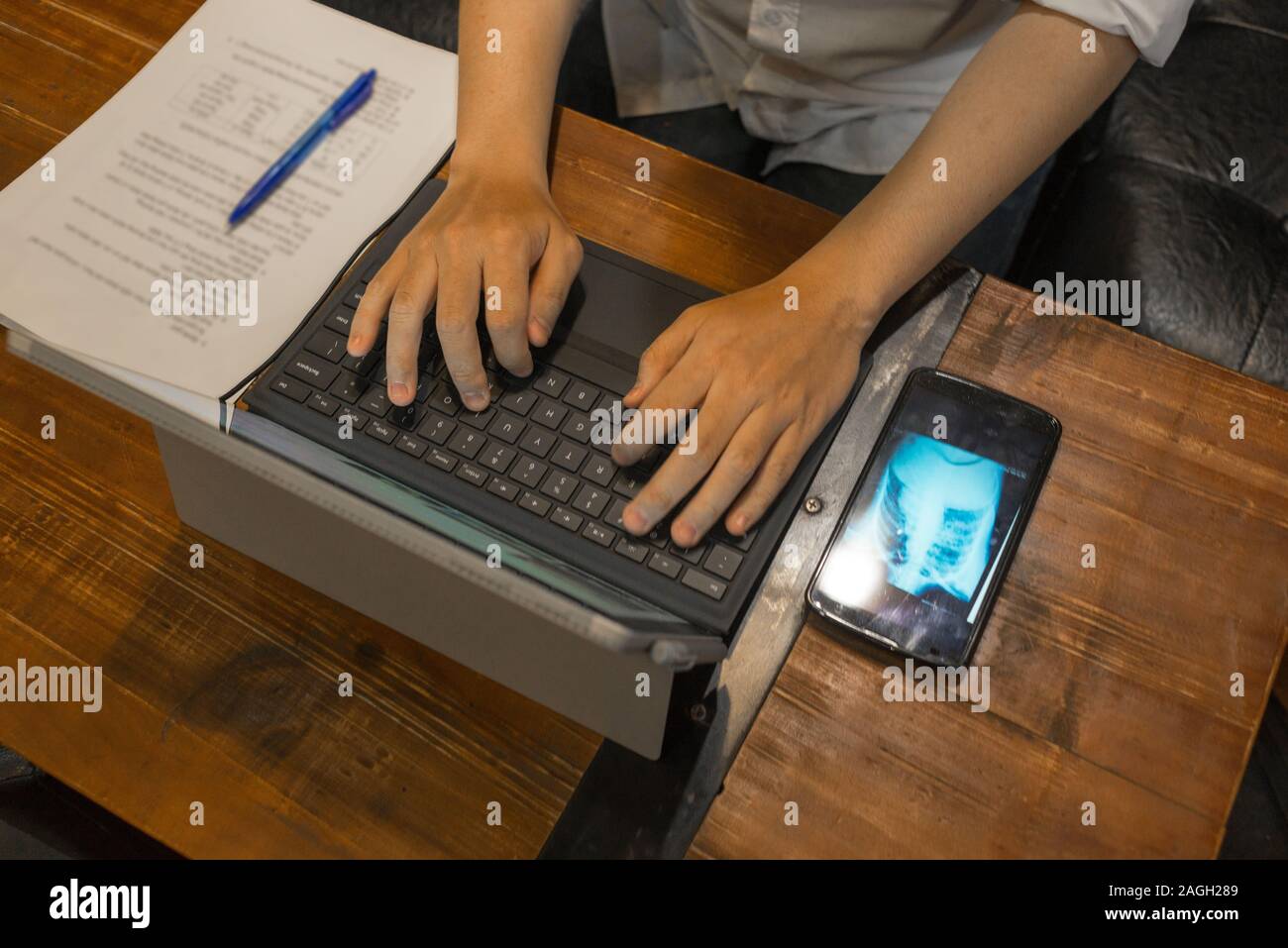 High angle view of human hands typing laptop keyboard Stock Photo - Alamy