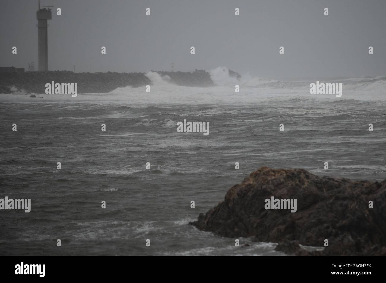 High waves crashing into a pontoon.Winds with gusts ranging from 95 km ...