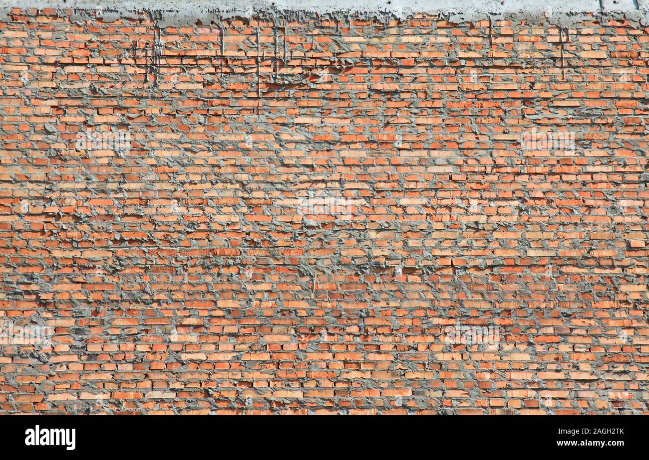 Red bricks wall texture and background. The fragment of bad and dirty ...