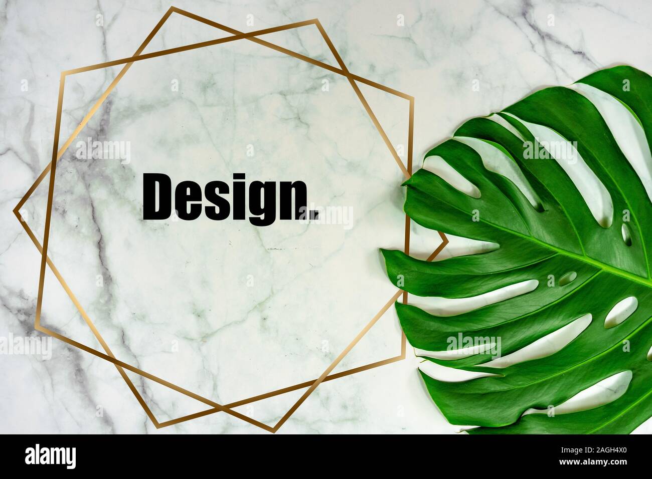 Marble background with monstera leaf and golden shape frame for text ...