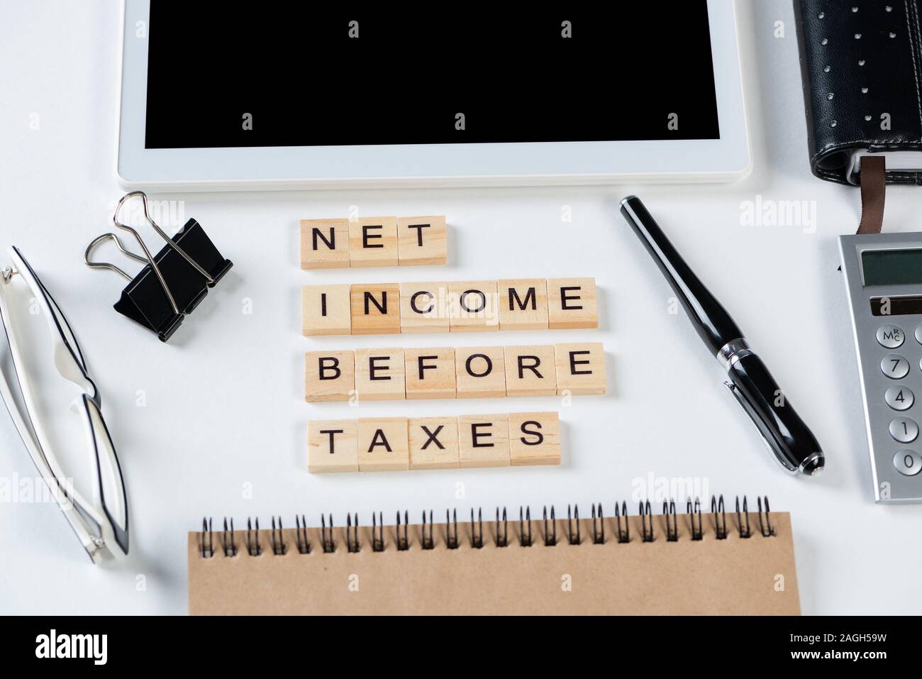 Earnings before taxes hi-res stock photography and images - Alamy