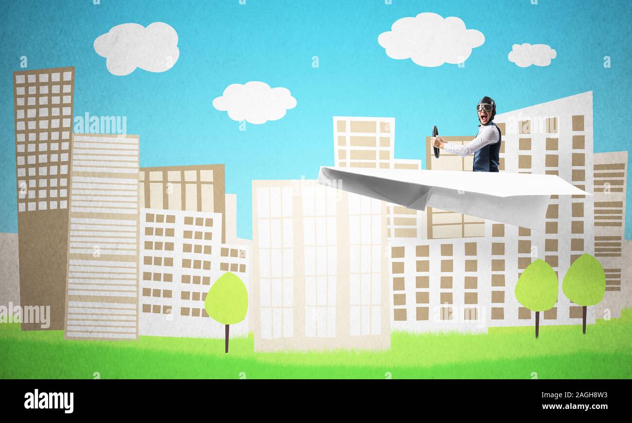 Aircraft pilot flying in paper plane Stock Photo - Alamy