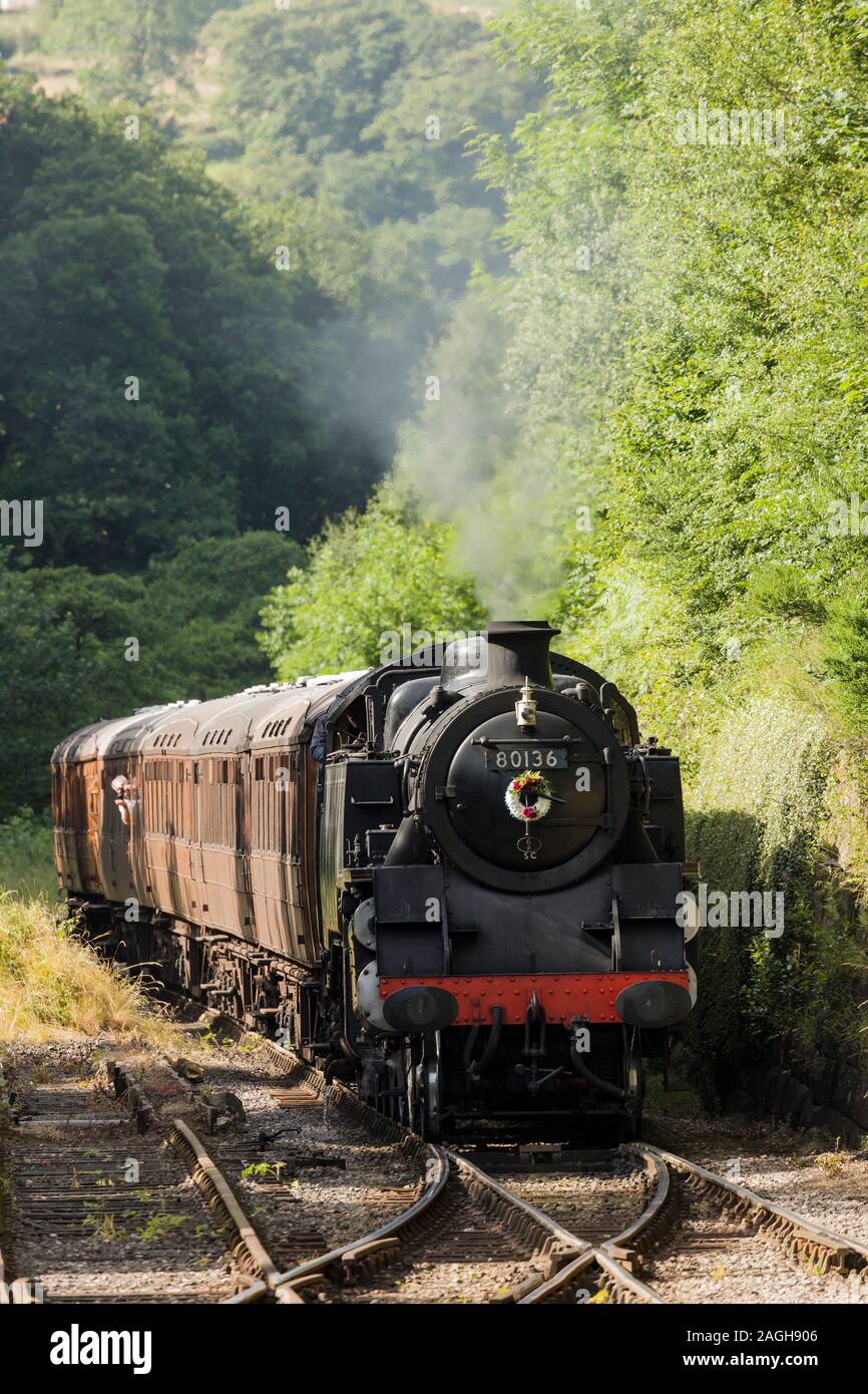 A steam train travelling from Whitby to Pickering is arriving at ...
