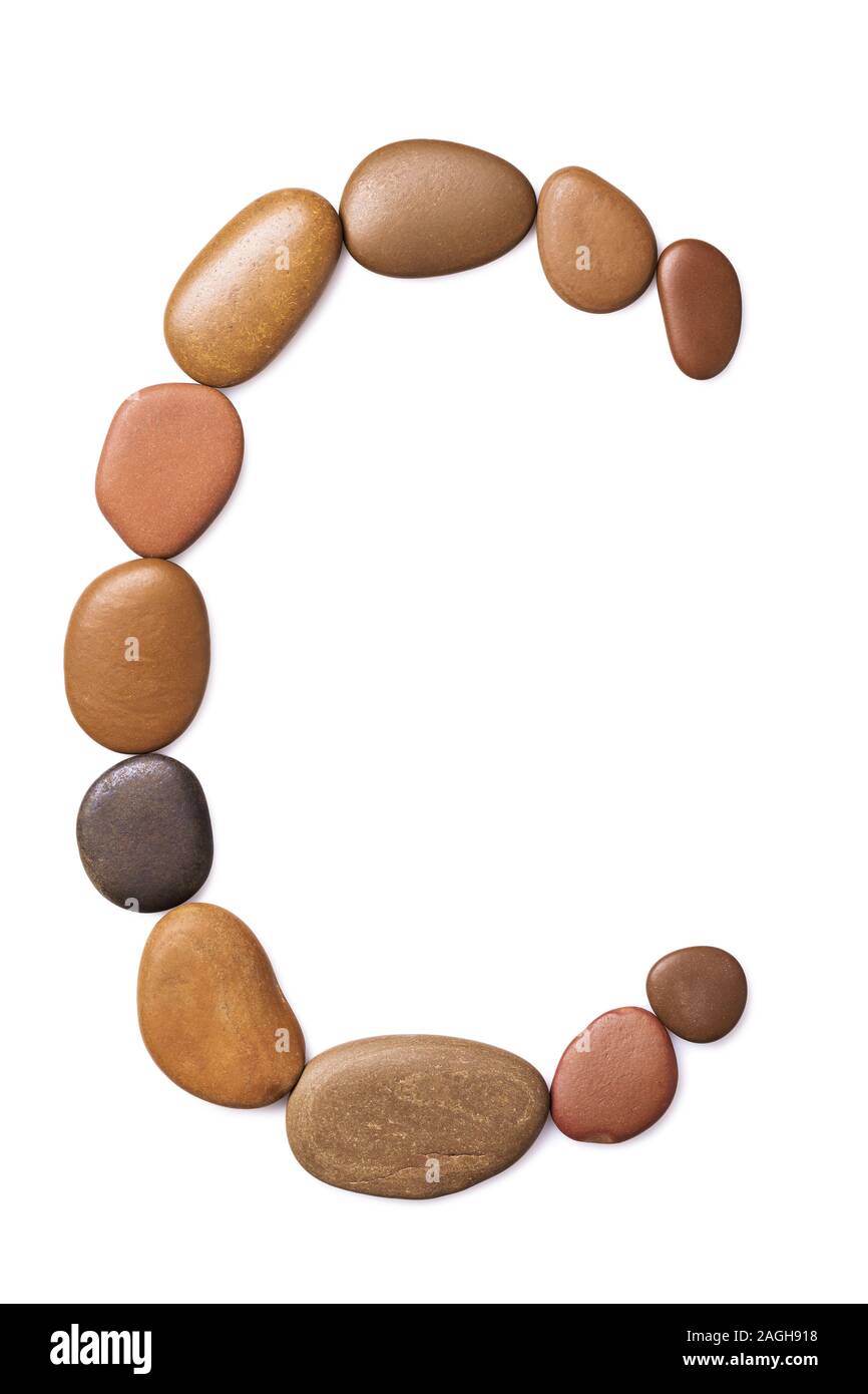 Letter C made of marine small pebbles, top view. Alphabet made of ...