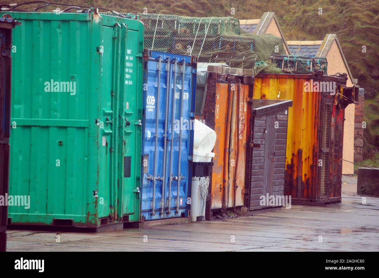Rusty steel containers Port Erroll, Cruden Bay, Scotland Stock Photo ...