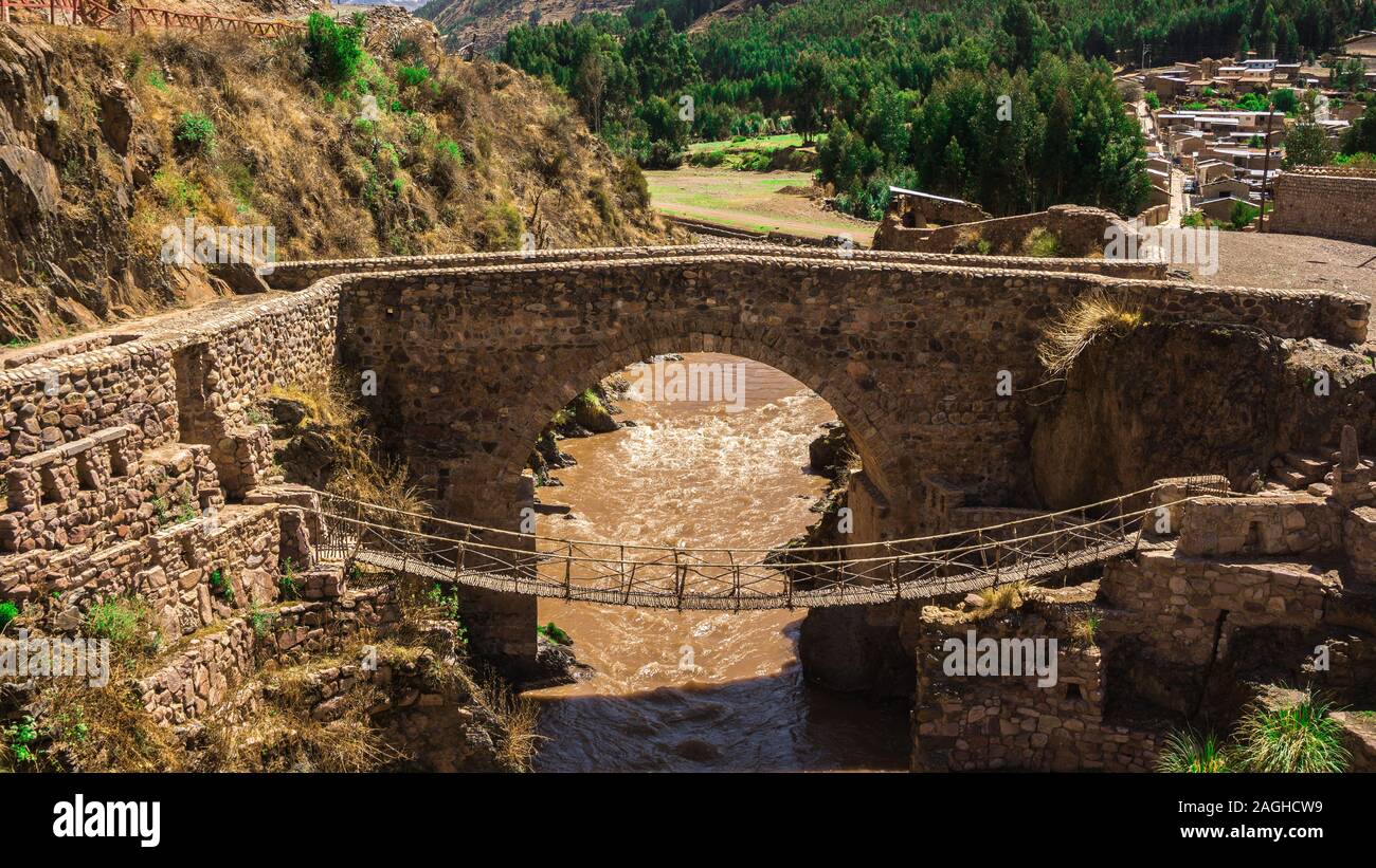The colonial Checacupe bridge is located on the Ausangate or Pitumayu ...