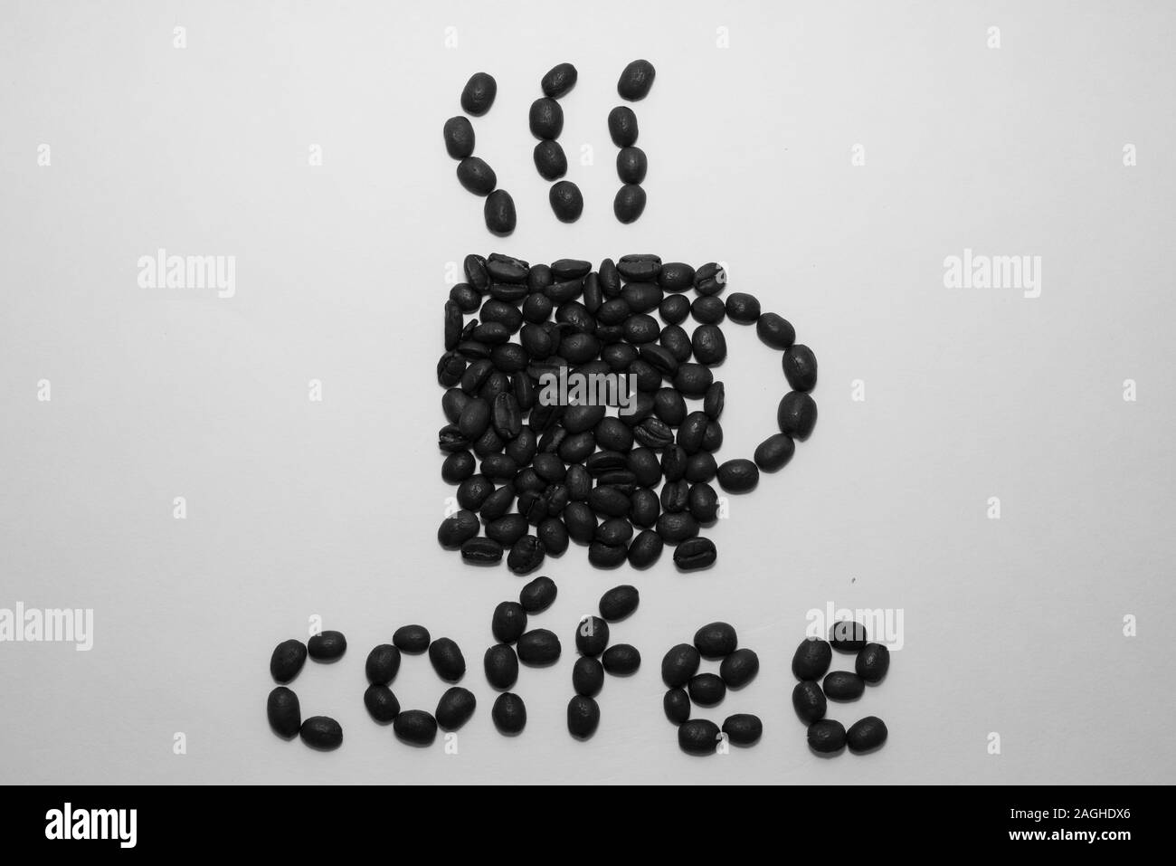 Cup of coffee shape and the word coffee created with coffee beans over ...