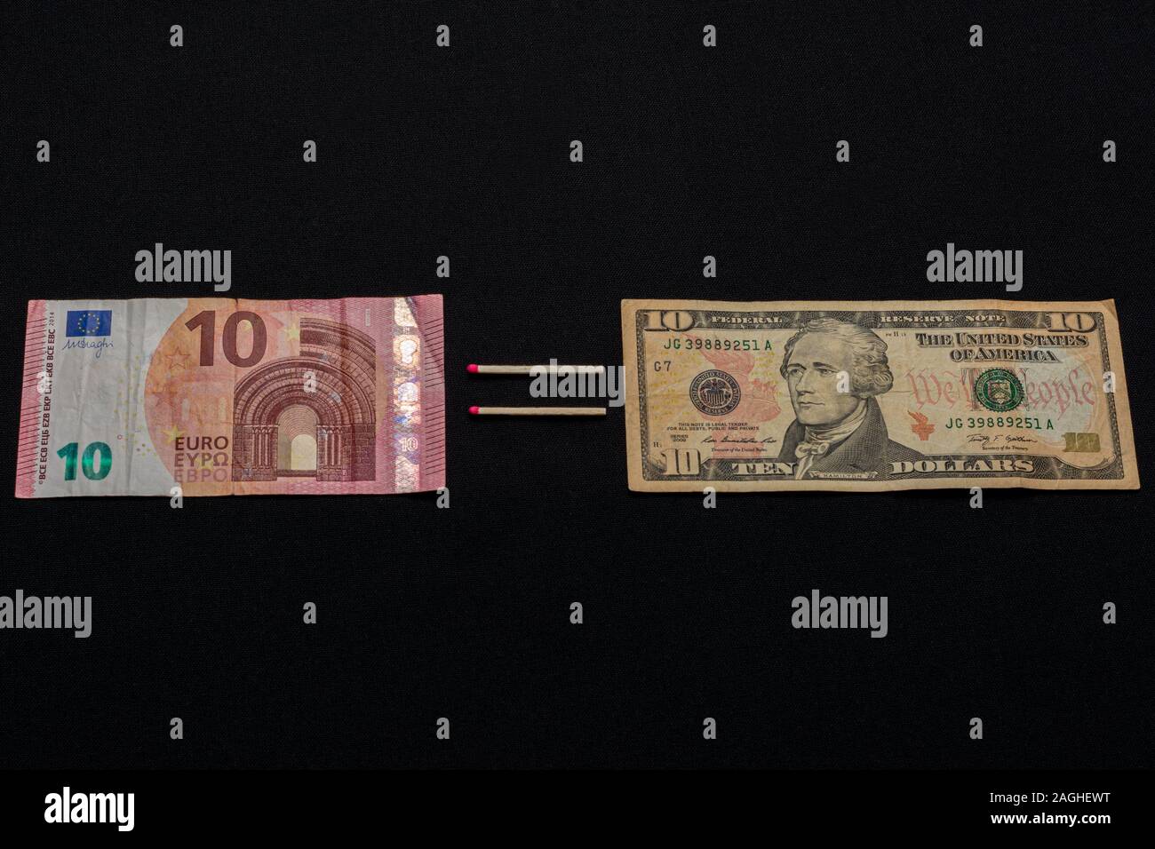 Dollars and euros on a black background, comparing ten euros to ten ...