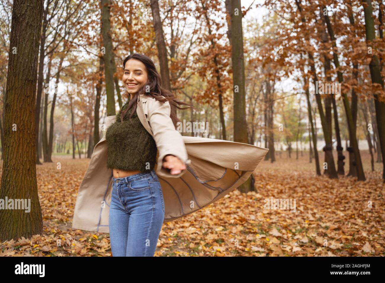Positive delighted female person looking straight at camera Stock Photo ...