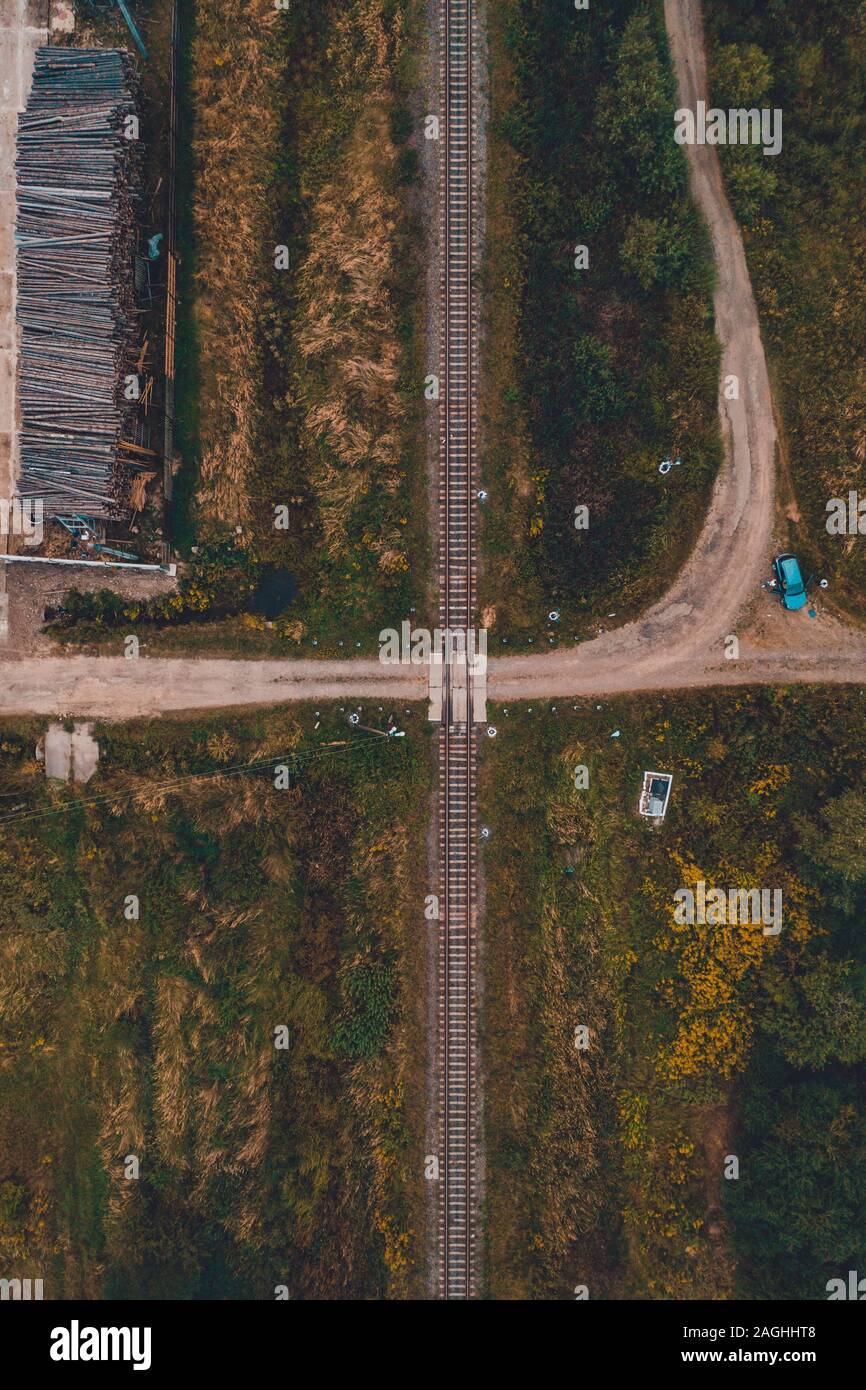 Aerial view shows the intersection of the railway tracks in the field ...