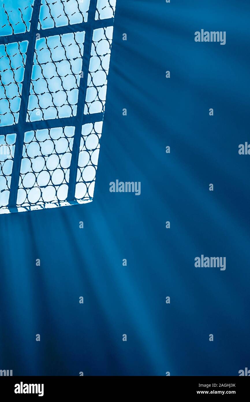 Mystical light. Blue light rays through the window. Classic blue color ...