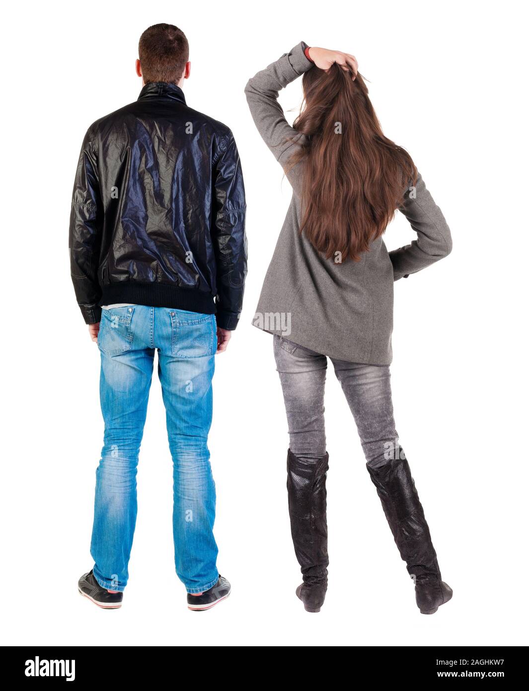 Back view of couple in winter jacket. beautiful friendly girl and guy ...