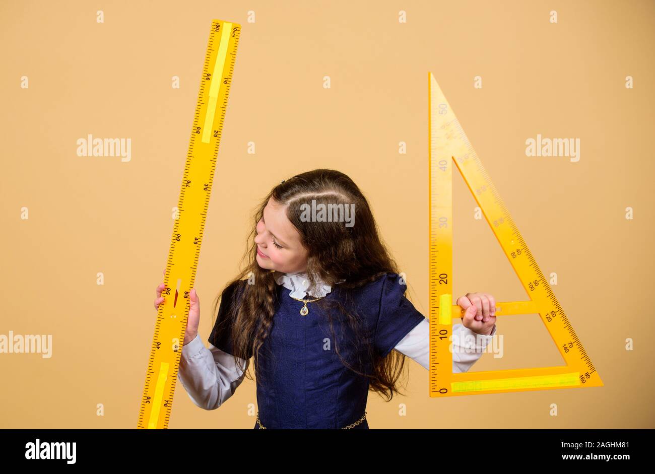 STEM school disciplines. School student learning geometry. small girl ...