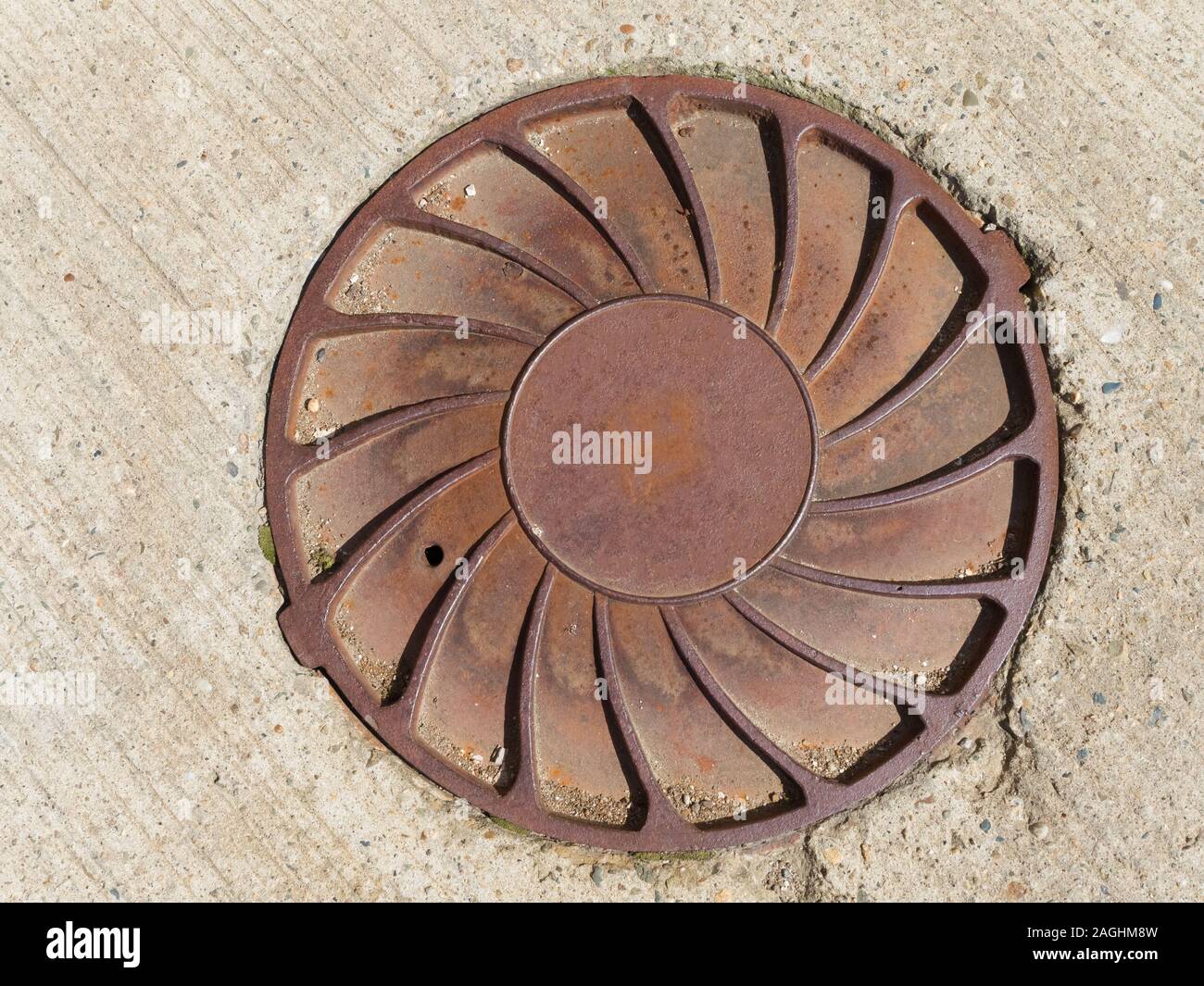 Sewer iron hatches in concrete Rosa Khutor Stock Photo - Alamy