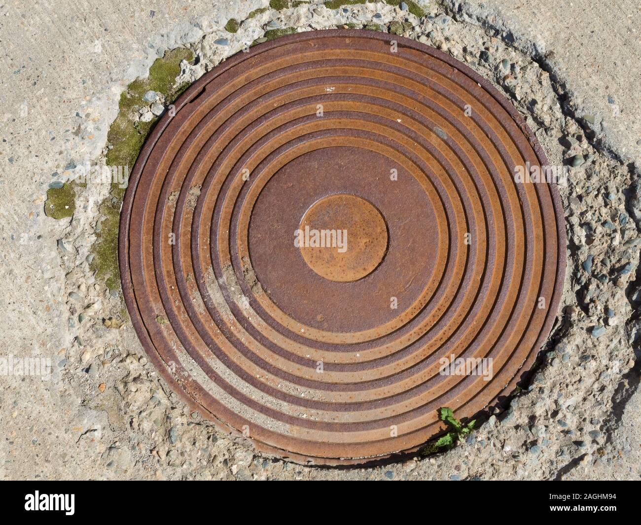 Sewer iron hatches in concrete Rosa Khutor Stock Photo - Alamy