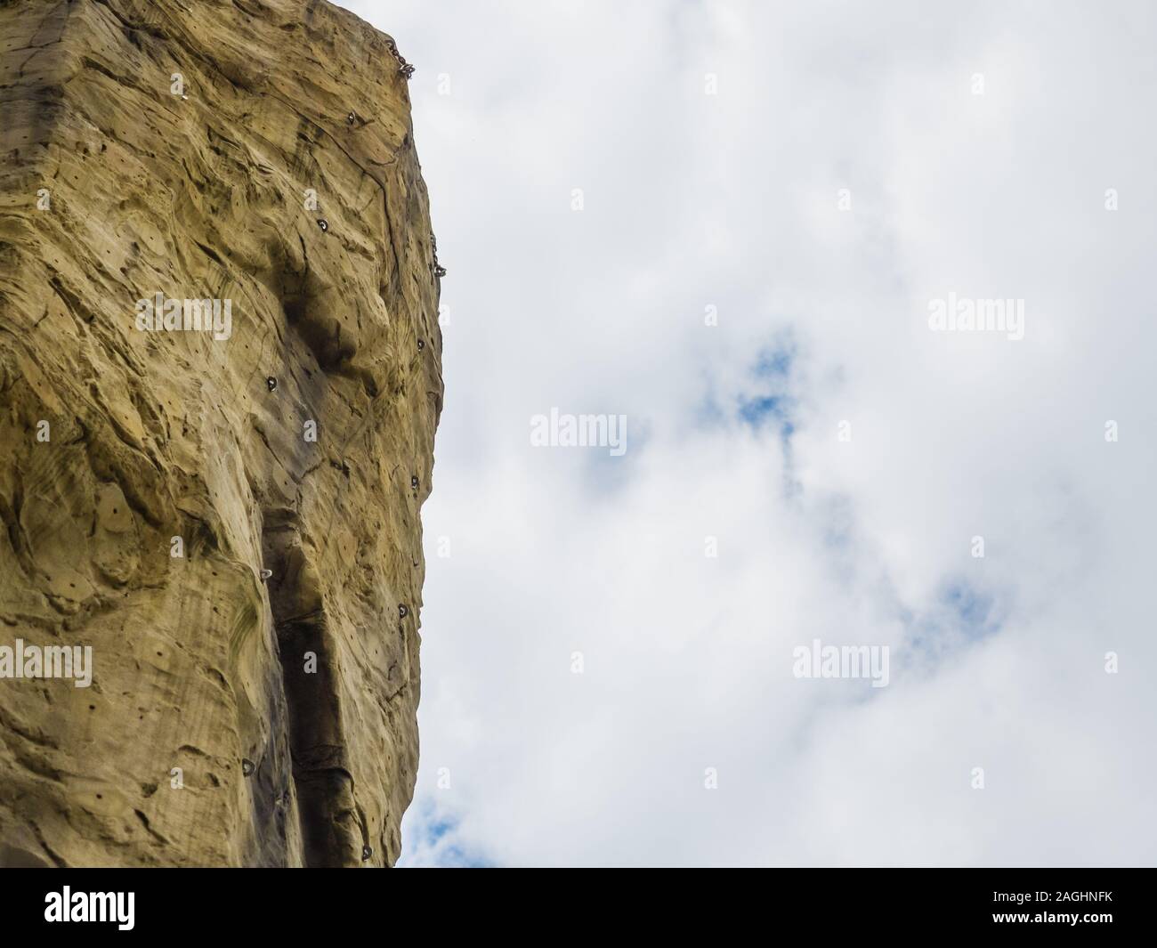Cliff with iron mounts rock climbers training Stock Photo - Alamy