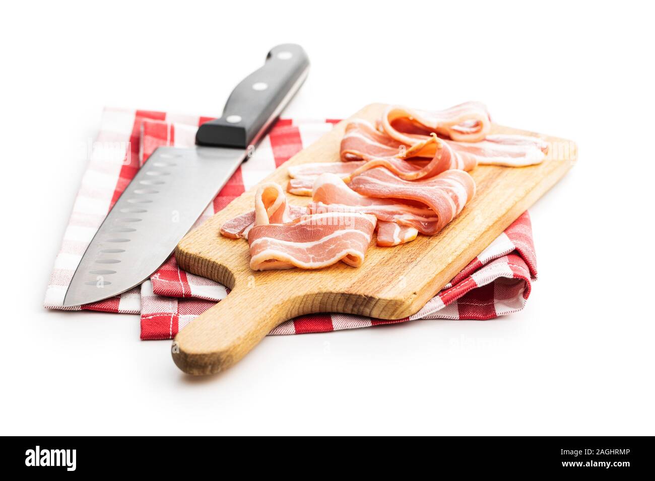 Smoked bacon strips on cutting board isolated on white background Stock ...