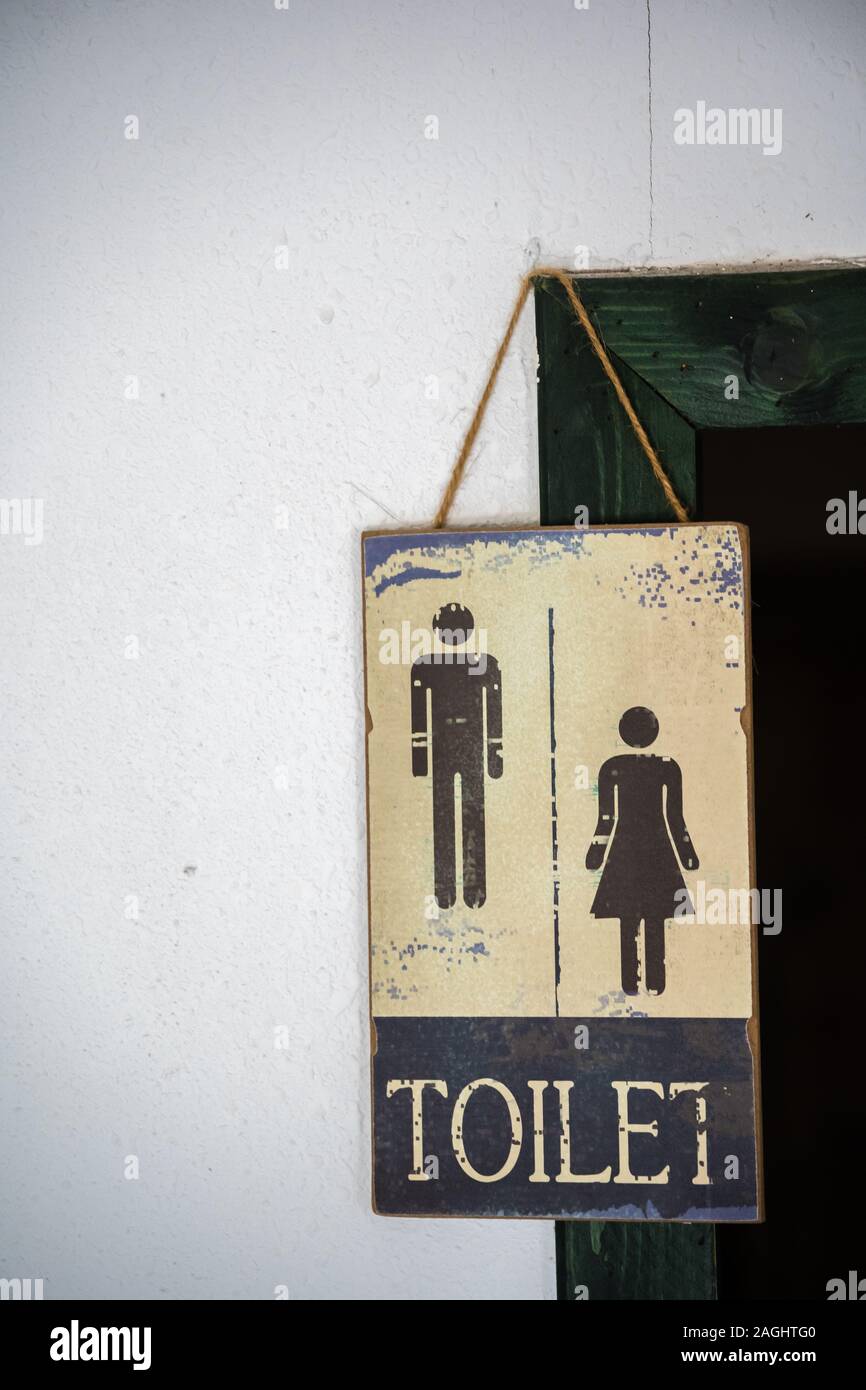 Hanging toilet sign hi-res stock photography and images - Alamy