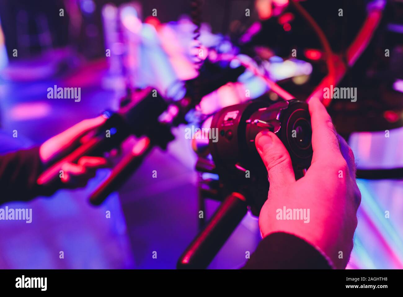 Professional equipment in a blue television news studio. Lighting ...
