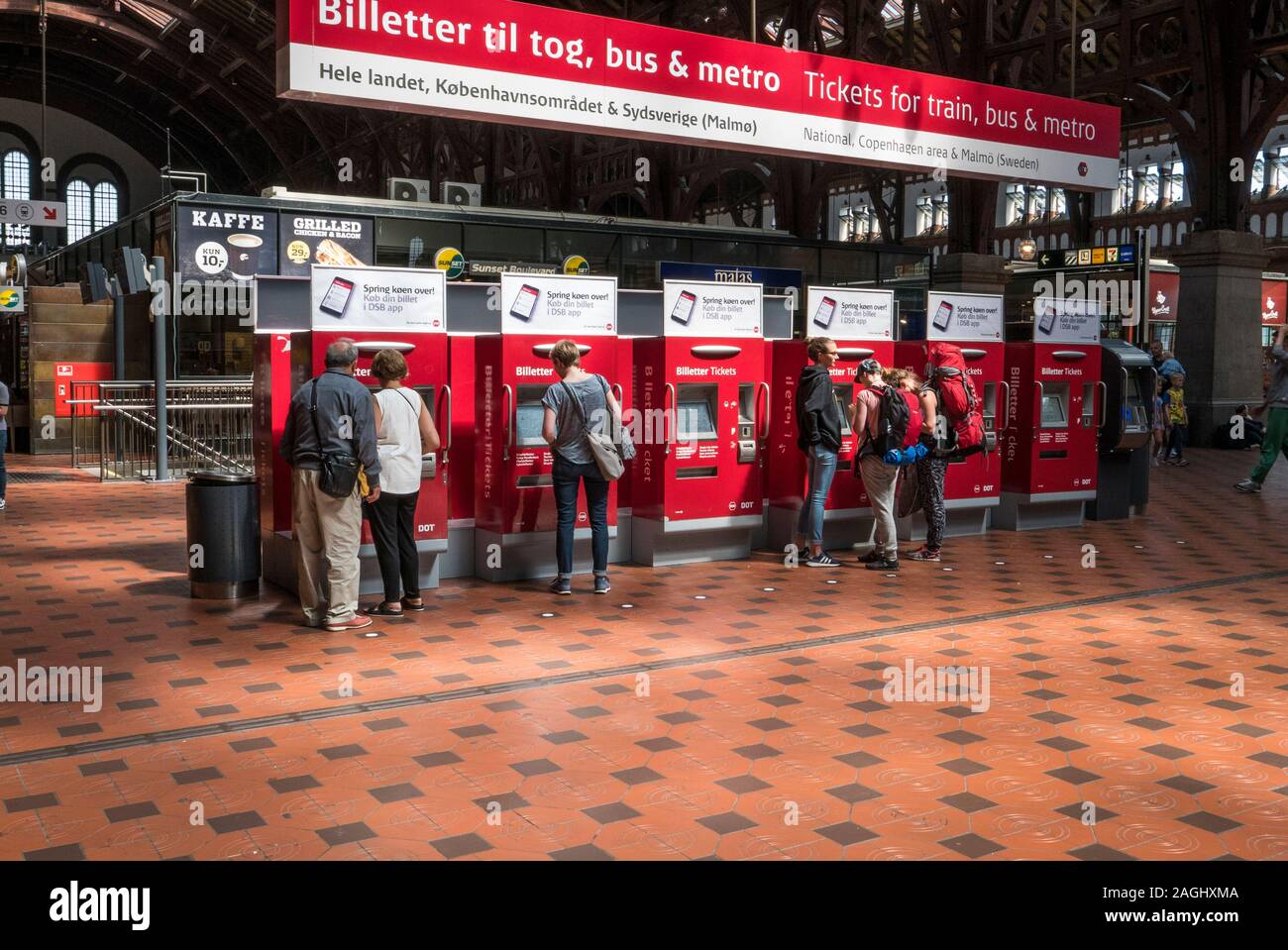 Commuters buying train tickets at the Central Train station in ...