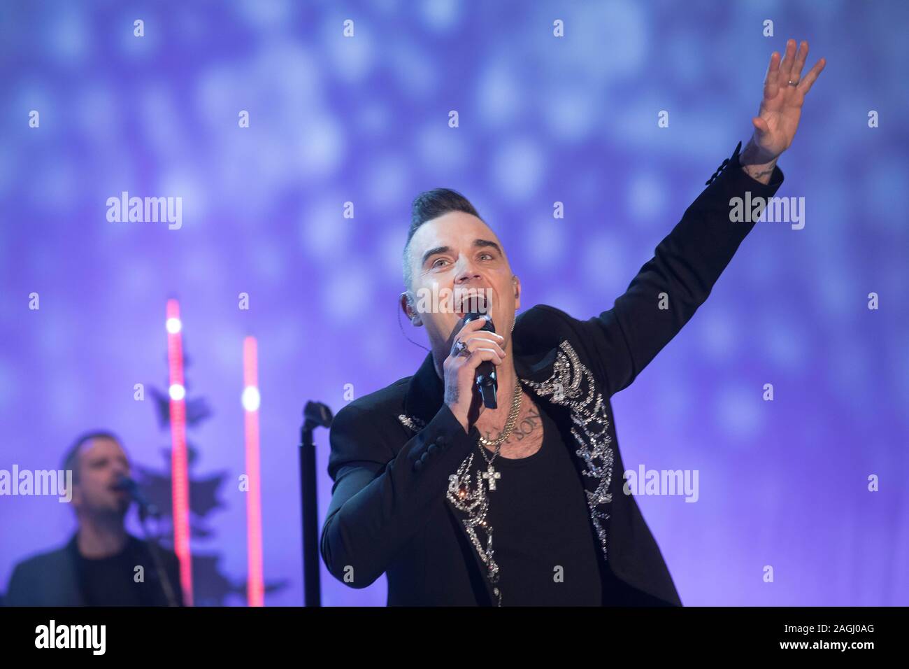 Robbie Williams performs during the filming for the Graham Norton Show ...