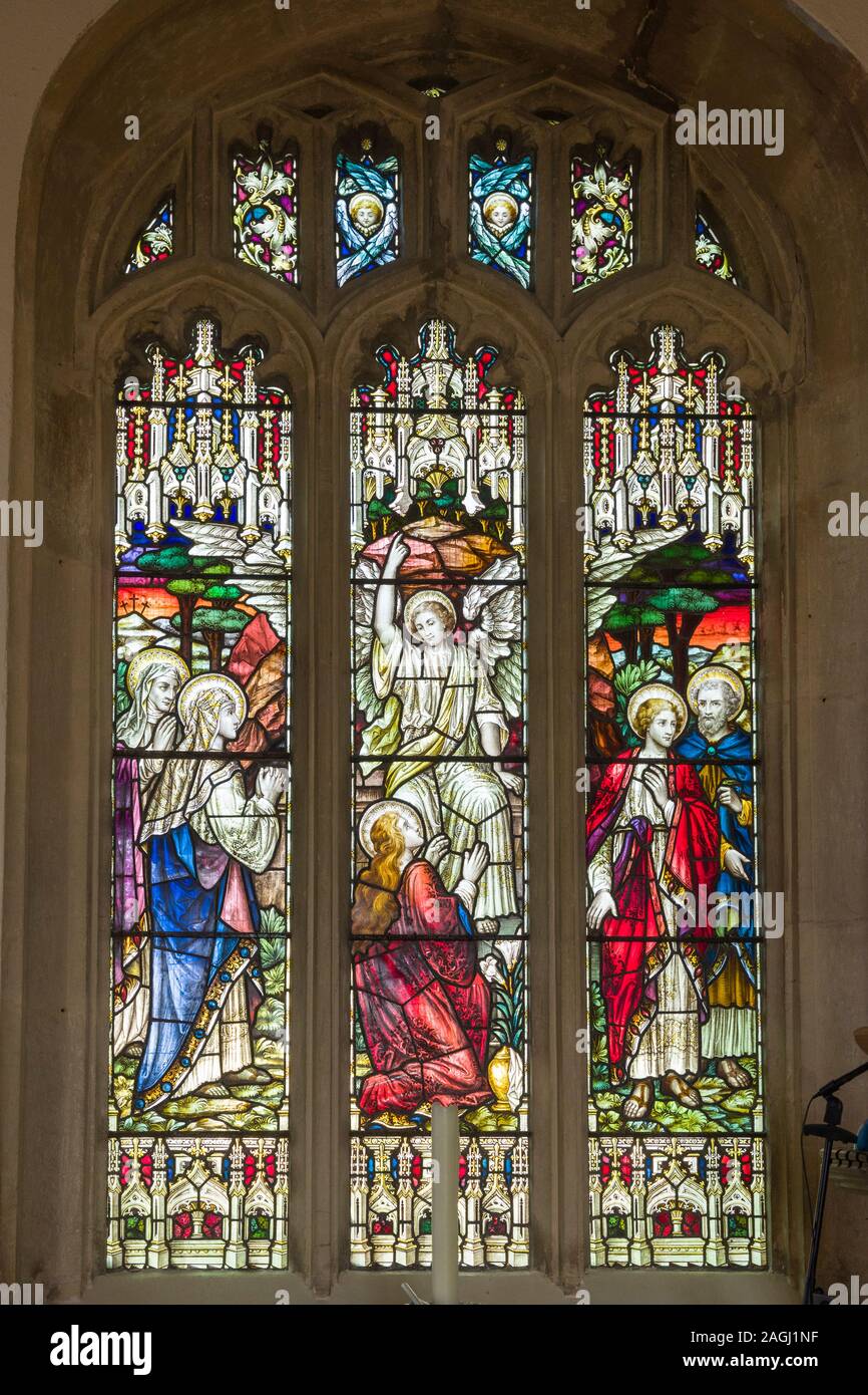 Stained glass window depictging religious themes in All Saints church ...