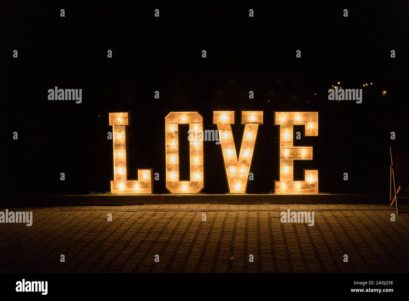 Illuminated Love sign in large letters at a wedding reception Stock ...