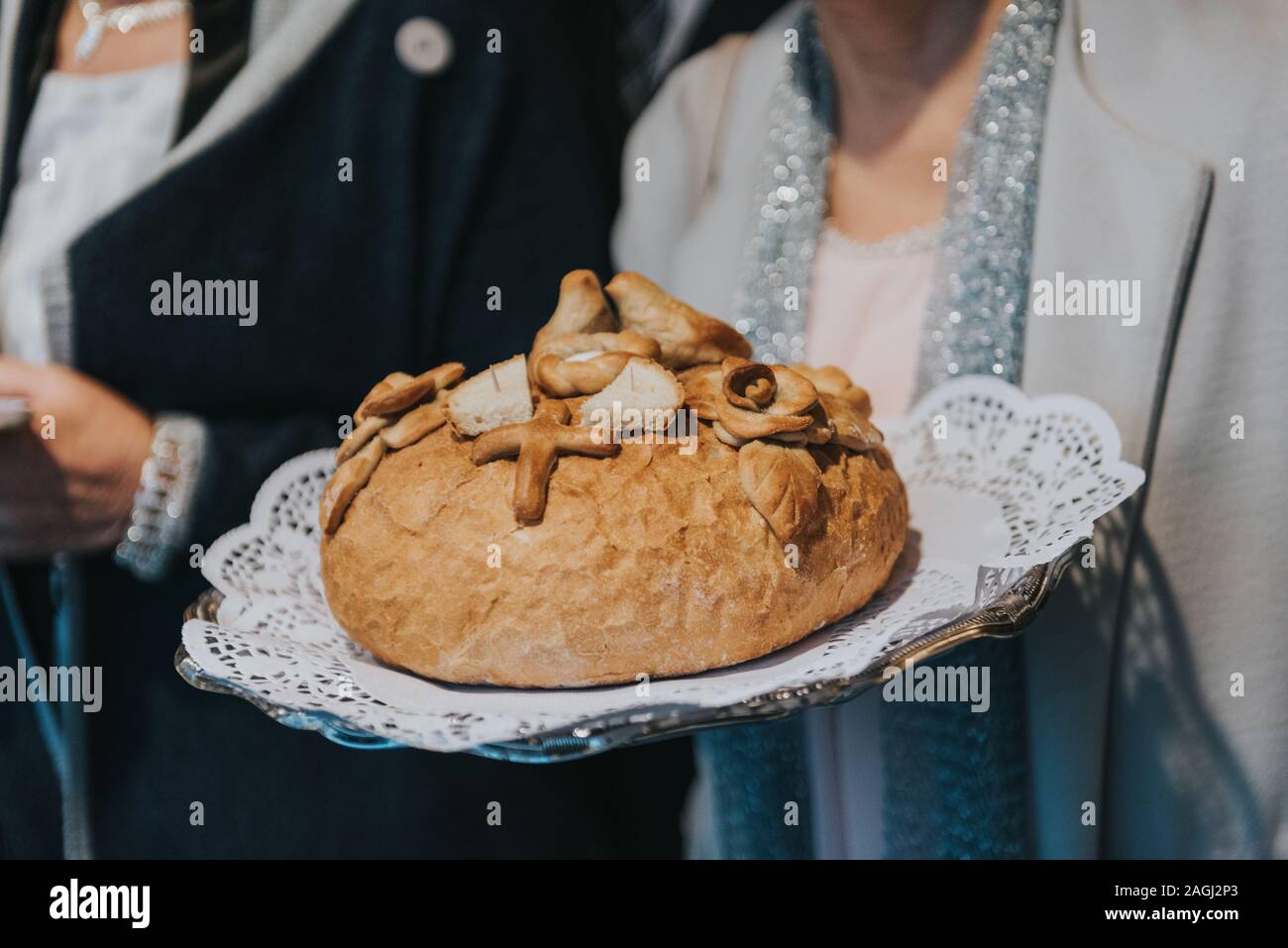 Traditional polish greeting the bride and groom by the parents with ...