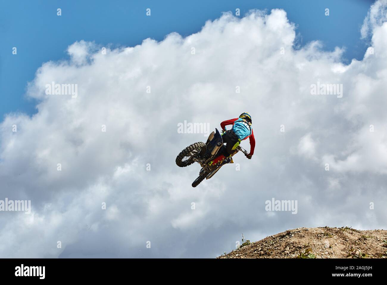 Extreme sports, motorcycle jumping. Motorcyclist makes an extreme jump ...