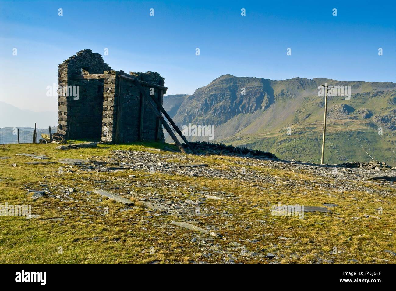 Abandoned winding house above an incline at Croesor Slate Mine in North ...