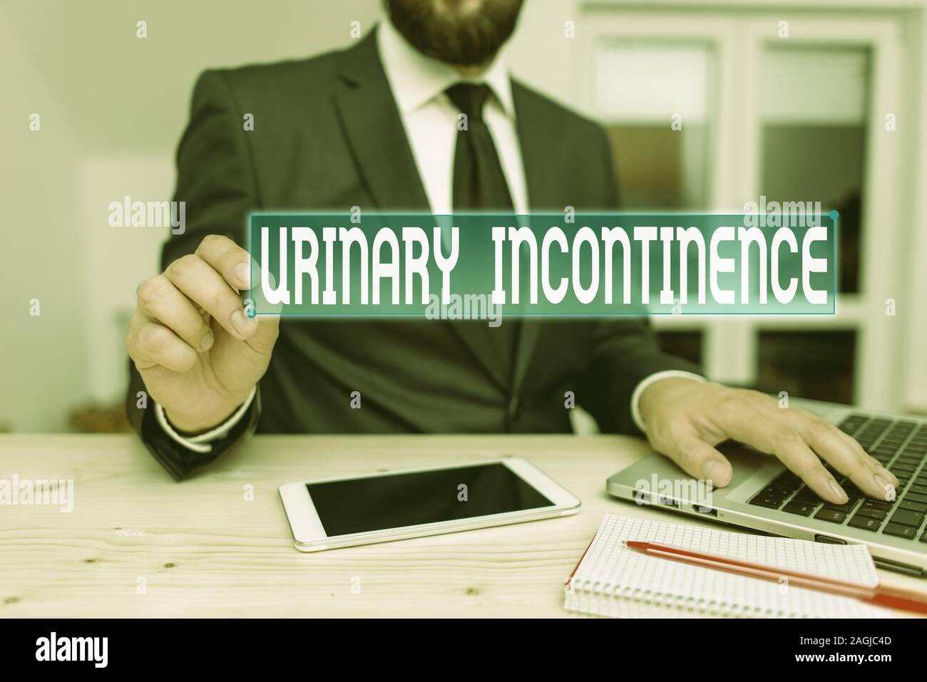 Writing note showing Urinary Incontinence. Business concept for ...
