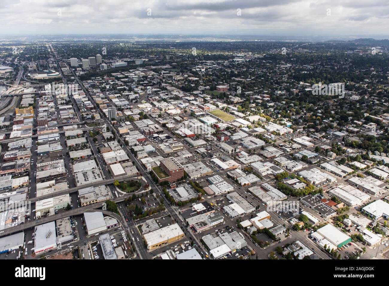 Aerial view of the building, streets and homes east of the Williamette ...