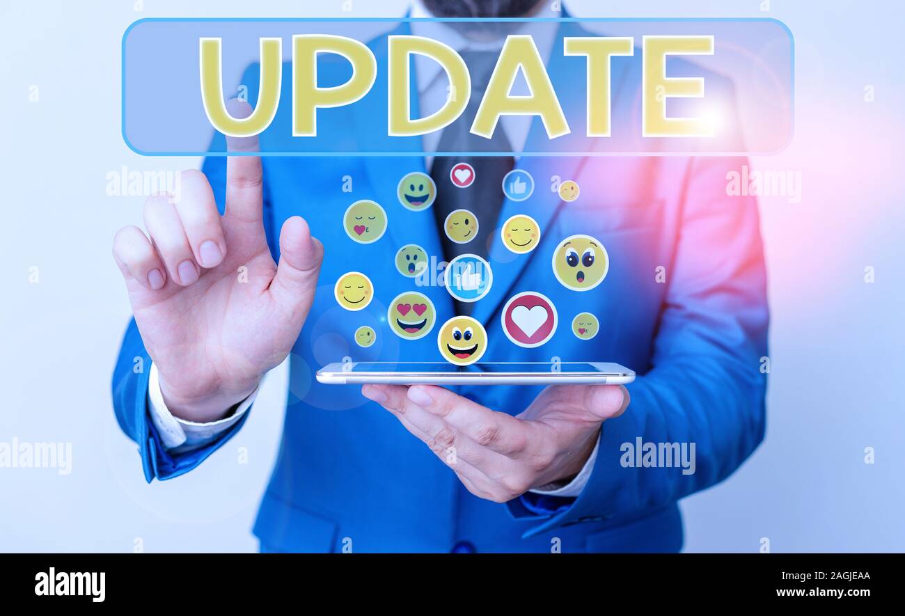 Conceptual hand writing showing Update. Concept meaning make something more modern or up to date ...