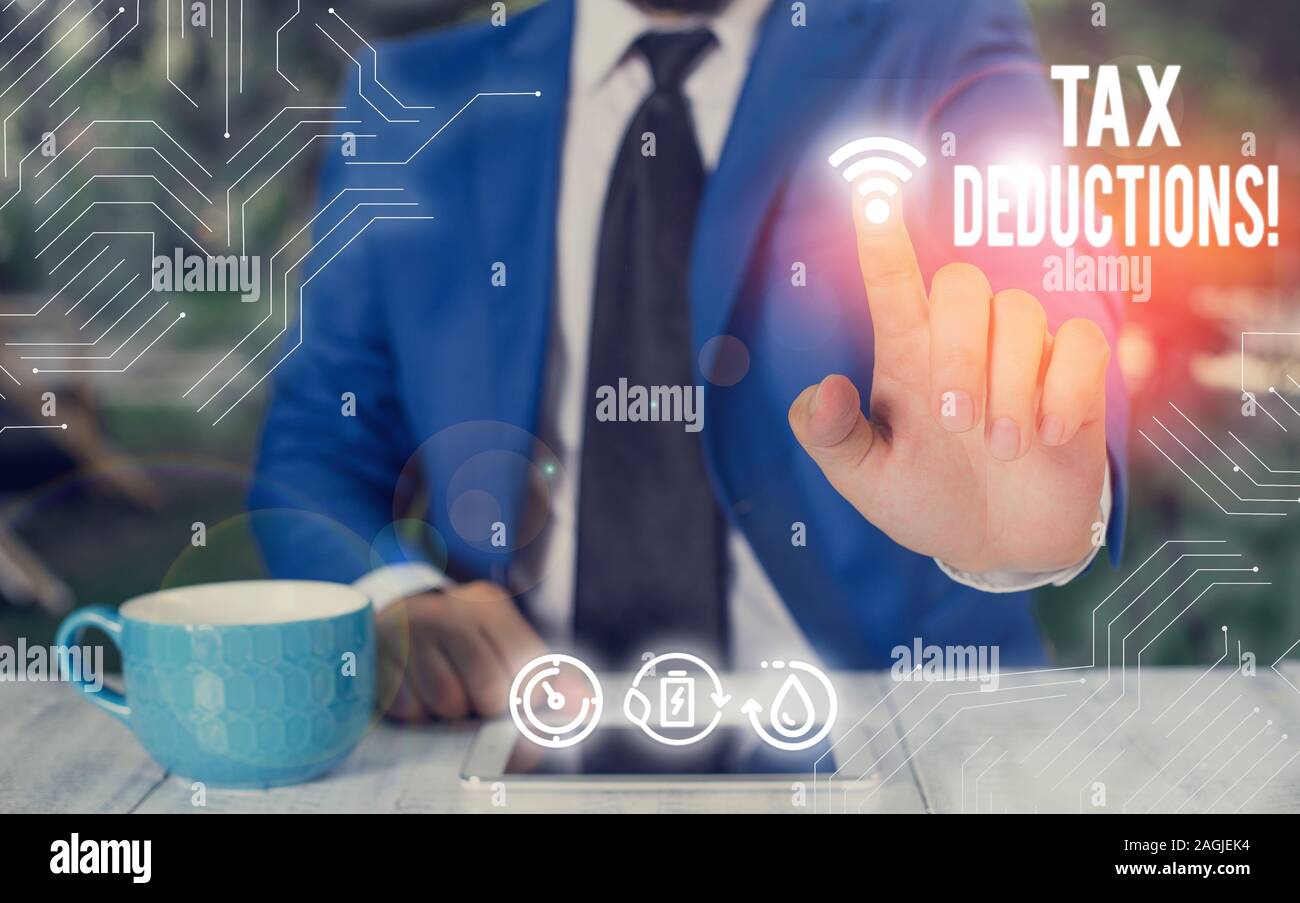 Text sign showing Tax Deductions. Business photo showcasing reduction ...