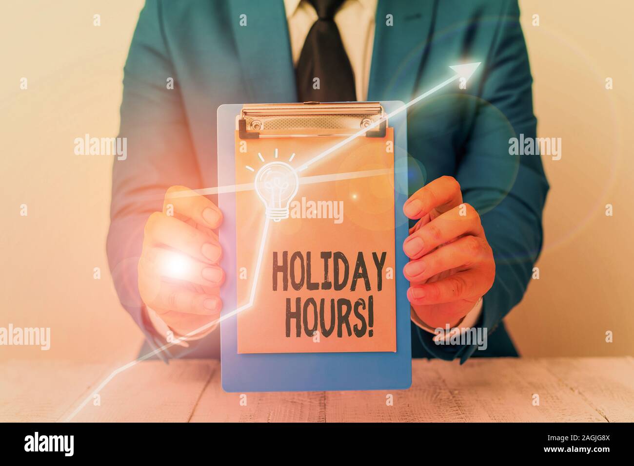 Writing note showing Holiday Hours. Business concept for Overtime work ...