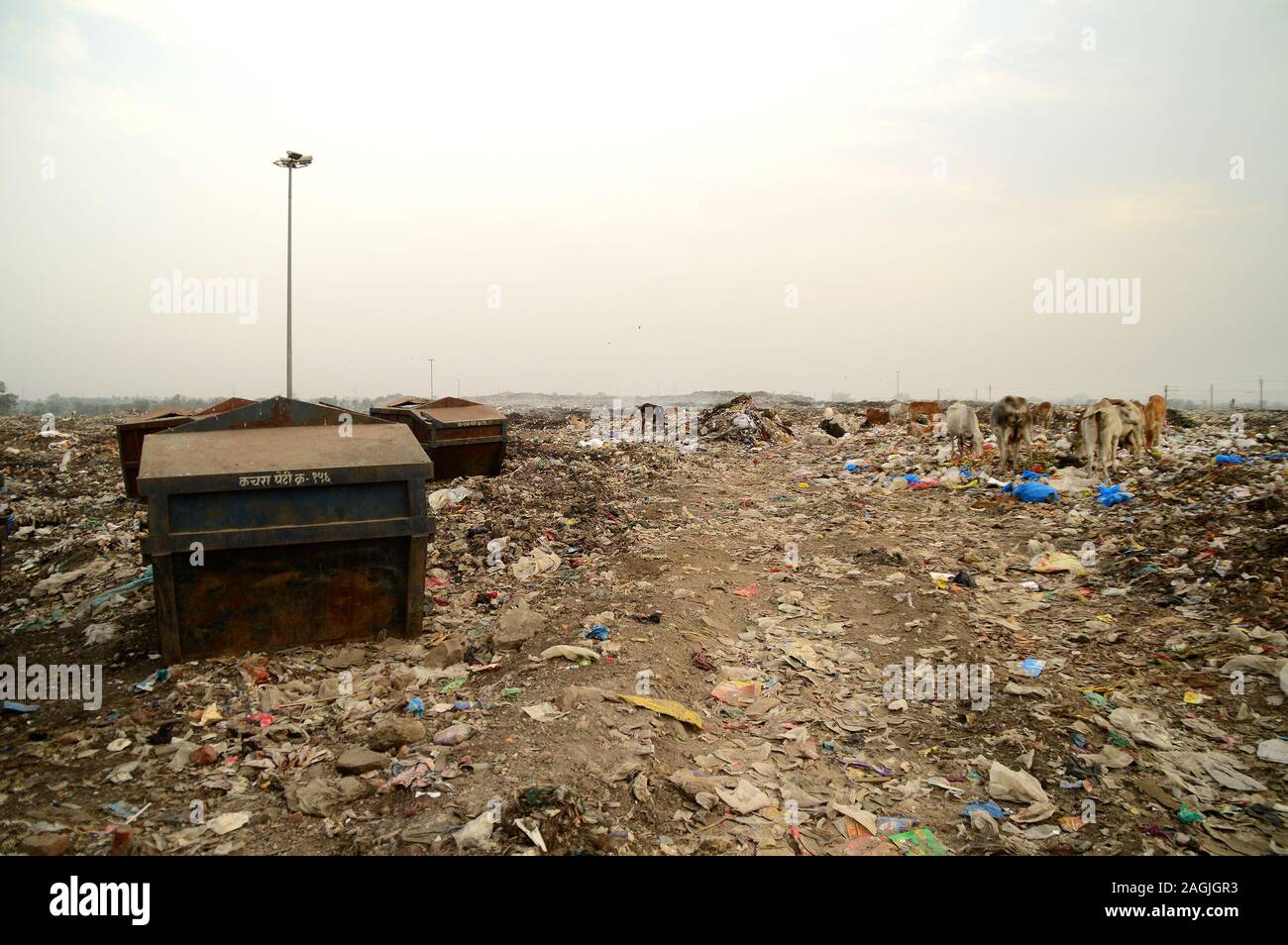 Big garbage land. Land and air pollution Stock Photo - Alamy