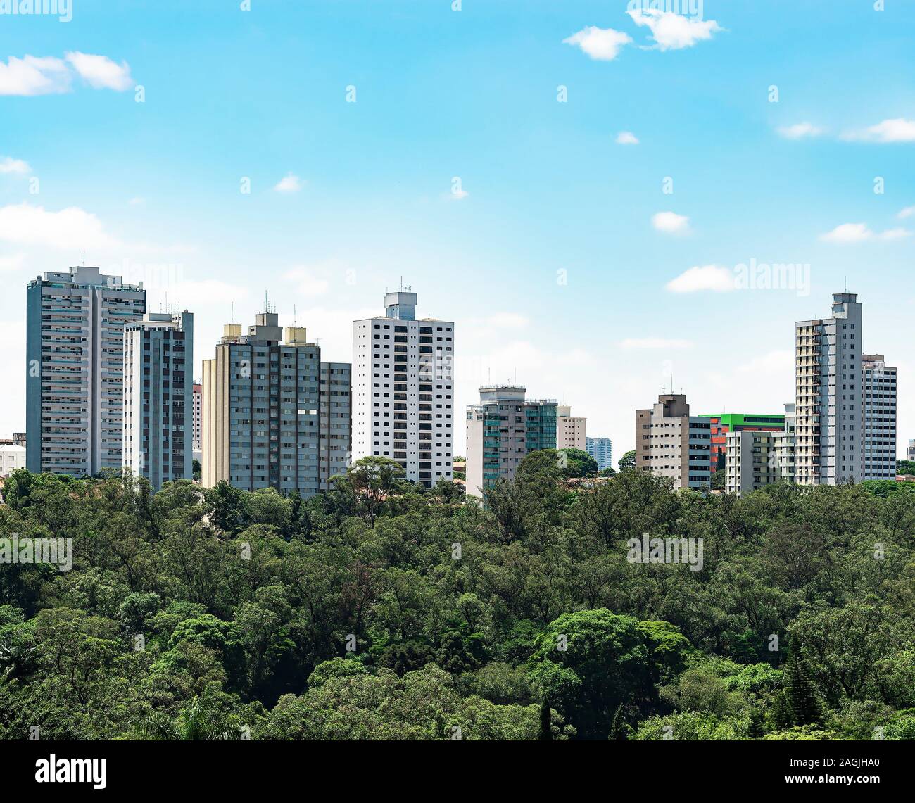 Buildings surrounded by trees hi-res stock photography and images - Alamy