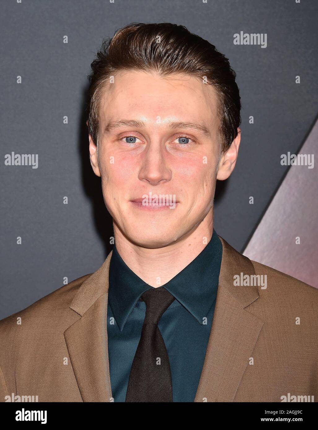 HOLLYWOOD, CA - DECEMBER 18: George MacKay attends the premiere of ...
