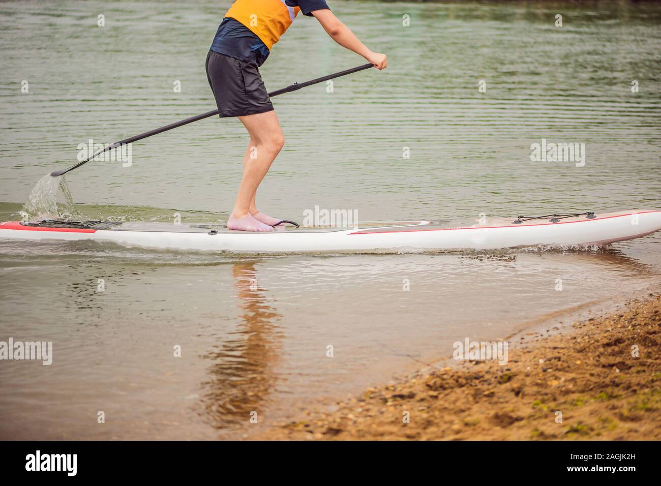 Active man paddleboard equipment hi-res stock photography and images ...
