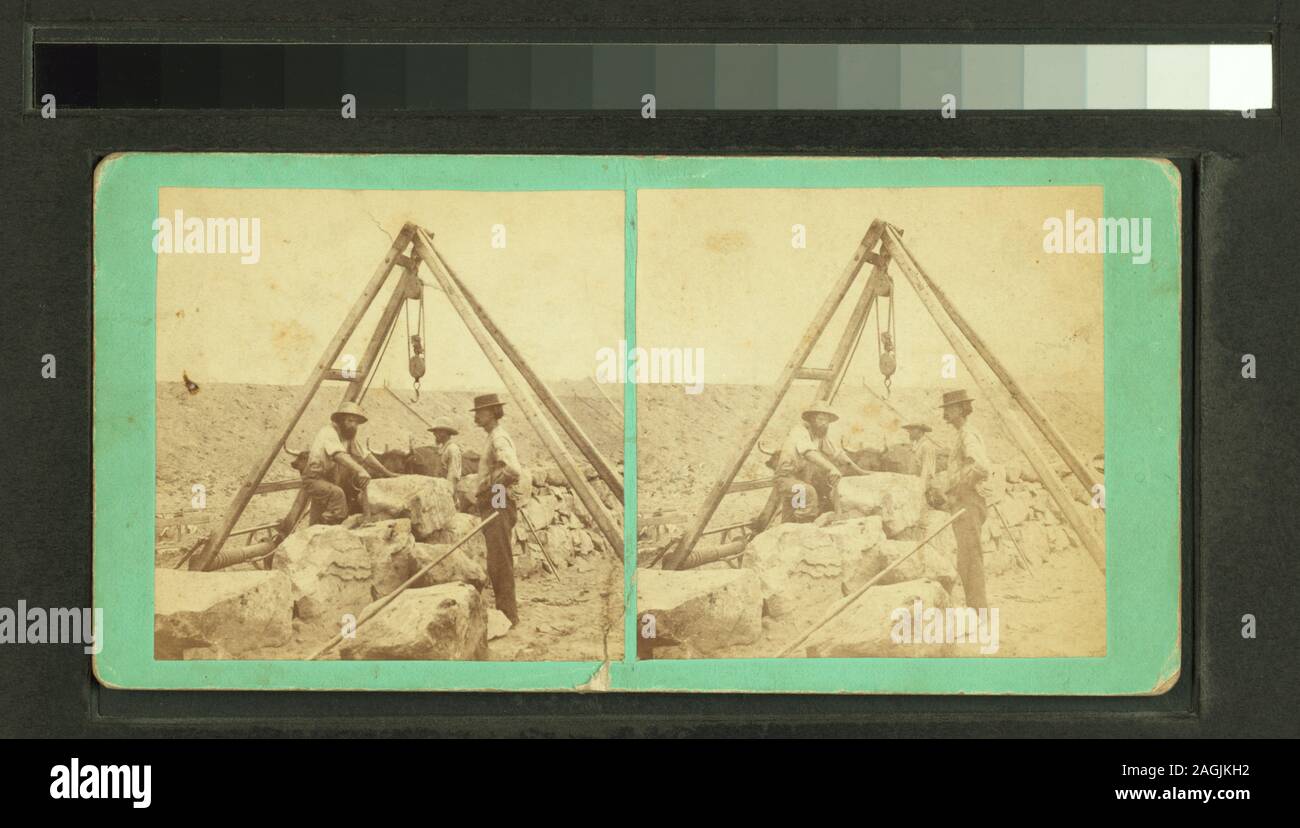 Men building a stone wall Men building a stone wall.; Men building a ...