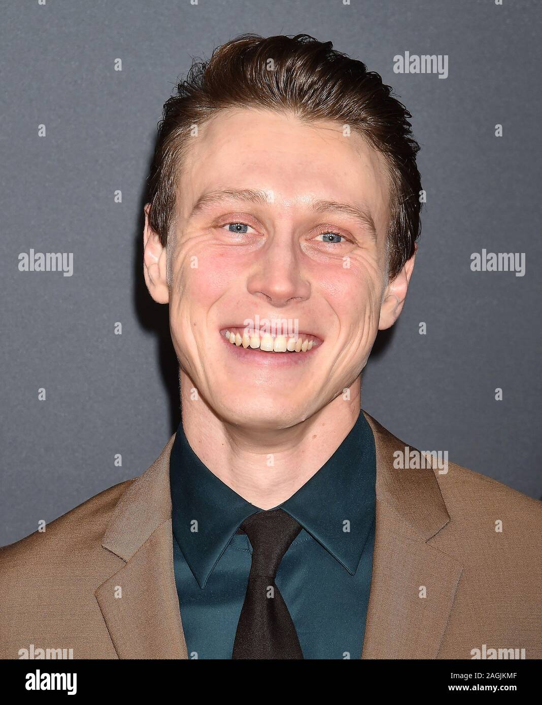 HOLLYWOOD, CA - DECEMBER 18: George MacKay attends the premiere of ...