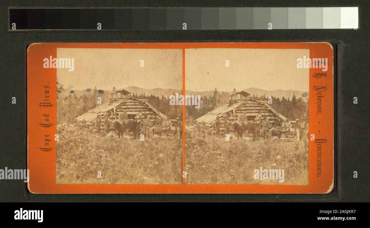 Men with fishing poles, rifles and pistols posed outside a log cabin at ...