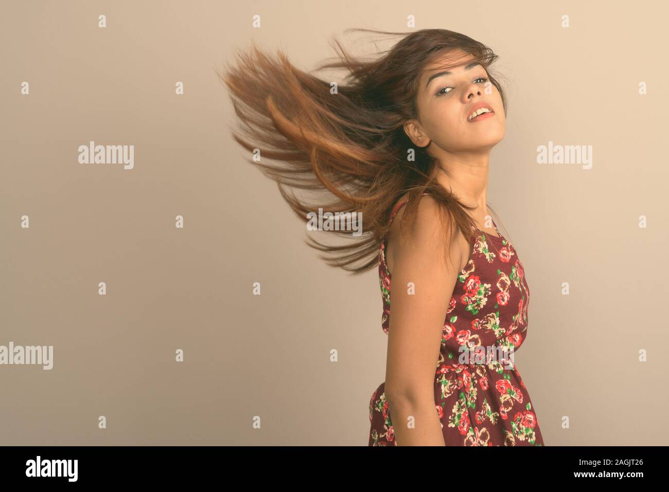 Girl flipping her hair hi-res stock photography and images - Alamy