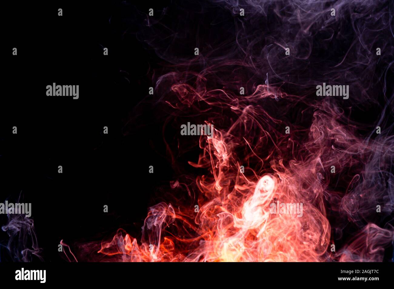 Abstract art blue and red colored smoke on black isolated background ...
